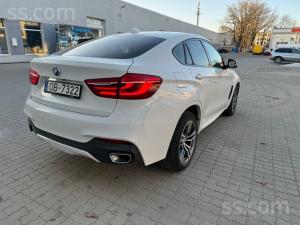 White BMW X6 2018 in Riga, with an engine capacity of 3.00 L and mileage of 0 thousand km for 38800 €, photo 5 on AUTOMOTO.COM.LV