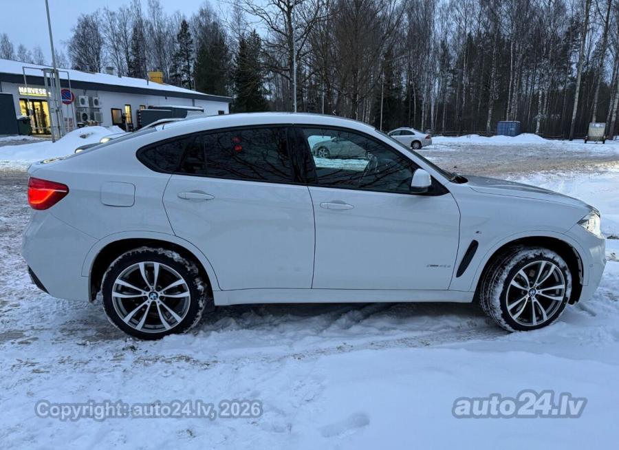 White BMW X6 2018 in Valmiera, with an engine capacity of 3.00 L and mileage of 158 thousand km for 37500 €, photo 6 on AUTOMOTO.COM.LV
