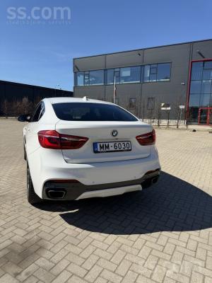 White BMW X6 2018 in Riga, with an engine capacity of 3.00 L and mileage of 207 thousand km for 29500 €, photo 6 on AUTOMOTO.COM.LV
