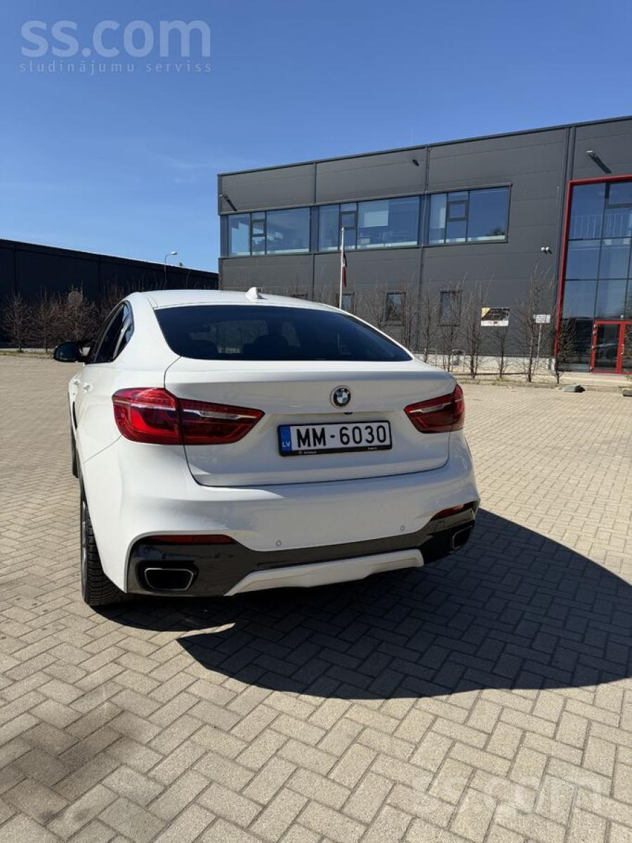 White BMW X6 2018 in Riga, with an engine capacity of 3.00 L and mileage of 207 thousand km for 29500 €, photo 6 on AUTOMOTO.COM.LV