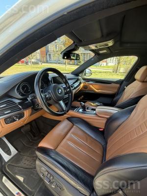 White BMW X6 2018 in Riga, with an engine capacity of 3.00 L and mileage of 207 thousand km for 29500 €, photo 7 on AUTOMOTO.COM.LV