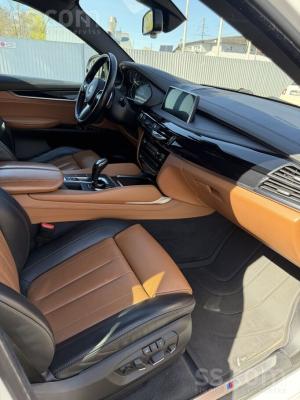 White BMW X6 2018 in Riga, with an engine capacity of 3.00 L and mileage of 207 thousand km for 29500 €, photo 8 on AUTOMOTO.COM.LV