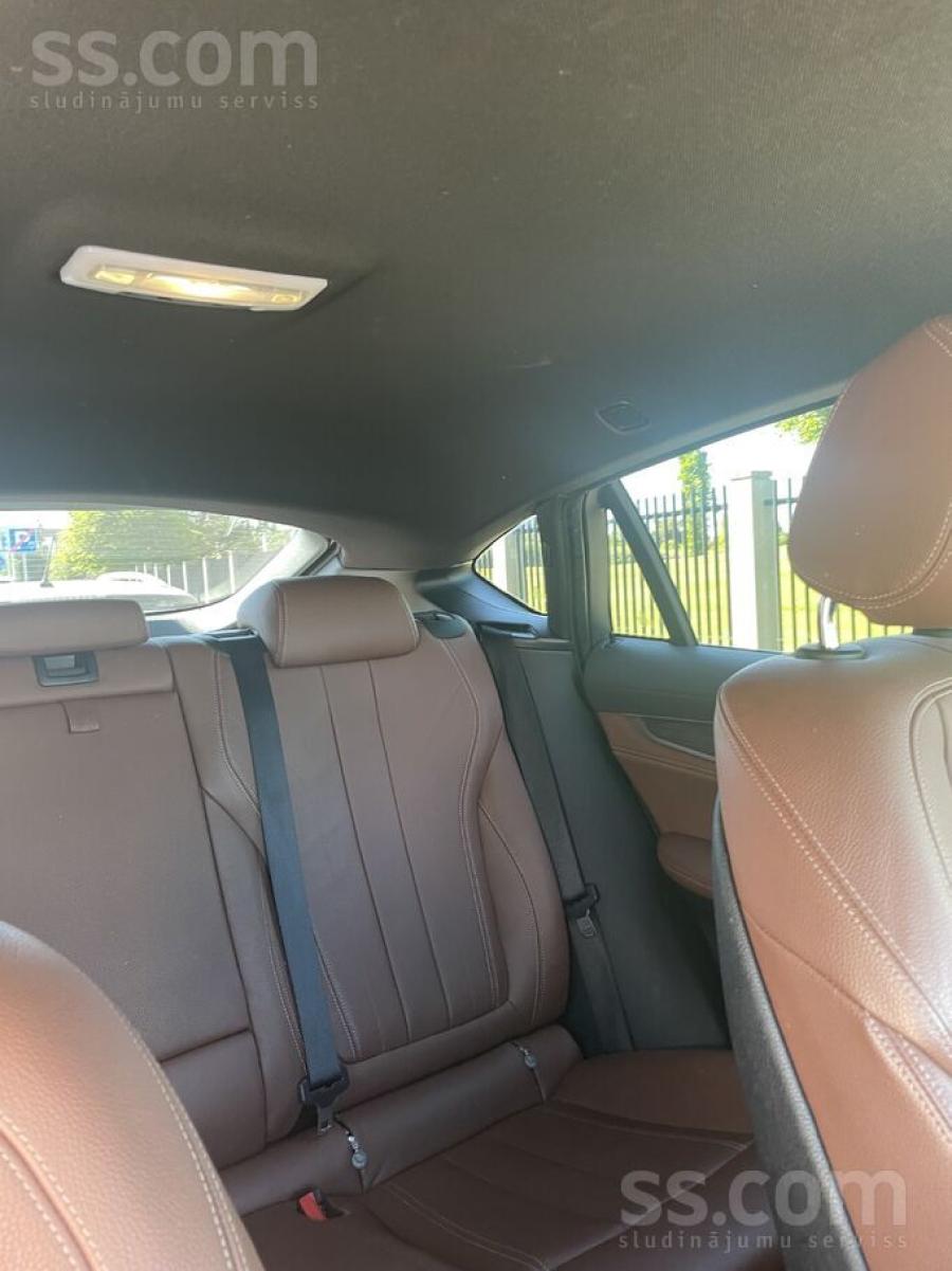 White BMW X6 2018 in Riga, with an engine capacity of 3.00 L and mileage of 220 thousand km for 22400 €, photo 11 on AUTOMOTO.COM.LV