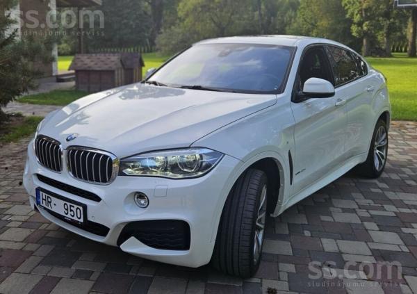 White BMW X6 2018 in Riga, with an engine capacity of 3.00 L and mileage of 148 thousand km for 30300 €, photo 1 on AUTOMOTO.COM.LV