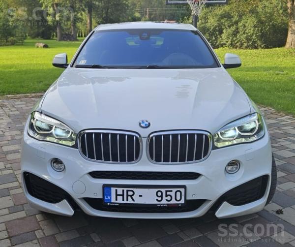White BMW X6 2018 in Riga, with an engine capacity of 3.00 L and mileage of 148 thousand km for 30300 €, photo 2 on AUTOMOTO.COM.LV