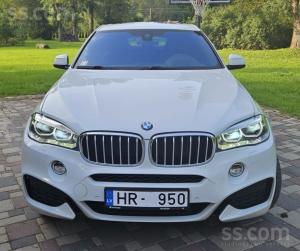 White BMW X6 2018 in Riga, with an engine capacity of 3.00 L and mileage of 148 thousand km for 30300 €, photo 3 on AUTOMOTO.COM.LV