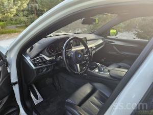White BMW X6 2018 in Riga, with an engine capacity of 3.00 L and mileage of 148 thousand km for 30300 €, photo 6 on AUTOMOTO.COM.LV
