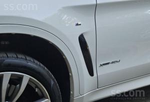 White BMW X6 2018 in Riga, with an engine capacity of 3.00 L and mileage of 148 thousand km for 30300 €, photo 7 on AUTOMOTO.COM.LV