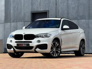 White BMW X6 2018 in Riga, with an engine capacity of 3.00 L and mileage of 232 thousand km for 25800 €, photo  on AUTOMOTO.COM.LV