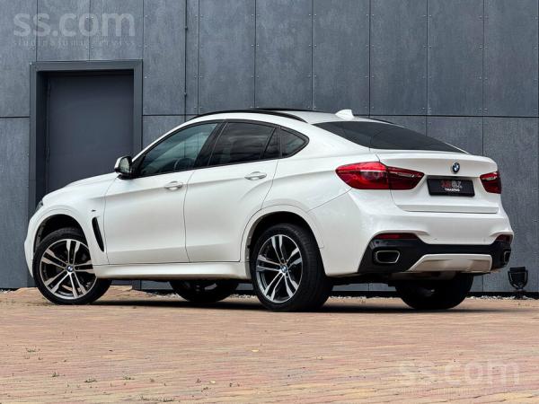 White BMW X6 2018 in Riga, with an engine capacity of 3.00 L and mileage of 232 thousand km for 25800 €, photo 2 on AUTOMOTO.COM.LV