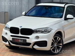 White BMW X6 2018 in Riga, with an engine capacity of 3.00 L and mileage of 232 thousand km for 25800 €, photo 7 on AUTOMOTO.COM.LV