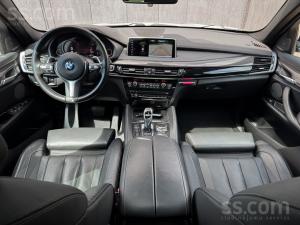 White BMW X6 2018 in Riga, with an engine capacity of 3.00 L and mileage of 232 thousand km for 25800 €, photo 9 on AUTOMOTO.COM.LV