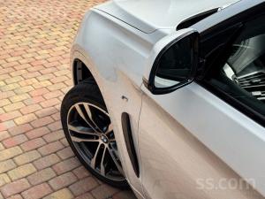 White BMW X6 2018 in Riga, with an engine capacity of 3.00 L and mileage of 232 thousand km for 25800 €, photo 22 on AUTOMOTO.COM.LV