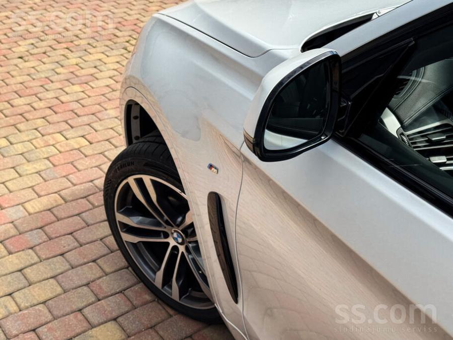 White BMW X6 2018 in Riga, with an engine capacity of 3.00 L and mileage of 232 thousand km for 25800 €, photo 22 on AUTOMOTO.COM.LV