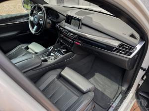 White BMW X6 2018 in Riga, with an engine capacity of 3.00 L and mileage of 232 thousand km for 25800 €, photo 30 on AUTOMOTO.COM.LV