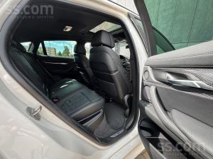 White BMW X6 2018 in Riga, with an engine capacity of 3.00 L and mileage of 232 thousand km for 25800 €, photo 32 on AUTOMOTO.COM.LV