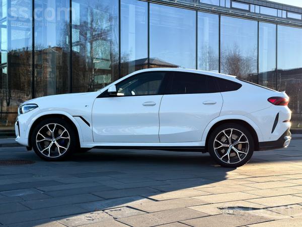 White BMW X6 2020 in Riga, with an engine capacity of 3.00 L and mileage of 157 thousand km for 52990 €, photo 4 on AUTOMOTO.COM.LV