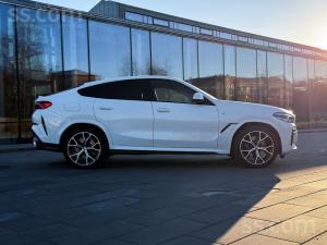 White BMW X6 2020 in Riga, with an engine capacity of 3.00 L and mileage of 157 thousand km for 52990 €, photo 6 on AUTOMOTO.COM.LV