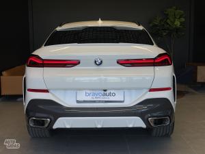 White BMW X6 2020 in Klaipeda, with an engine capacity of 3.00 L and mileage of 143 thousand km for 55991 €, photo 6 on AUTOMOTO.COM.LV
