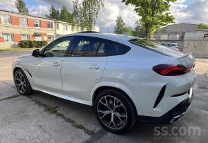 White BMW X6 2020 in Riga, with an engine capacity of 3.00 L and mileage of 108 thousand km for 55750 €, photo 6 on AUTOMOTO.COM.LV