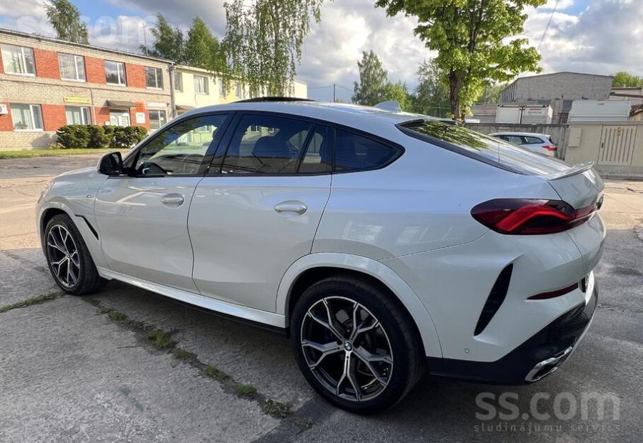 White BMW X6 2020 in Riga, with an engine capacity of 3.00 L and mileage of 108 thousand km for 55750 €, photo 6 on AUTOMOTO.COM.LV