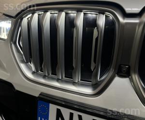 White BMW X6 2020 in Riga, with an engine capacity of 3.00 L and mileage of 108 thousand km for 55750 €, photo 30 on AUTOMOTO.COM.LV