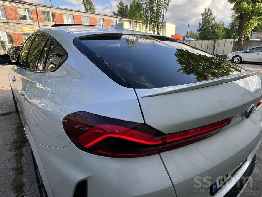 White BMW X6 2020 in Riga, with an engine capacity of 3.00 L and mileage of 108 thousand km for 55750 €, photo 31 on AUTOMOTO.COM.LV