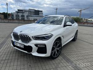White BMW X6 2020 in Riga, with an engine capacity of 3.00 L and mileage of 99 thousand km for 56900 €, photo  on AUTOMOTO.COM.LV