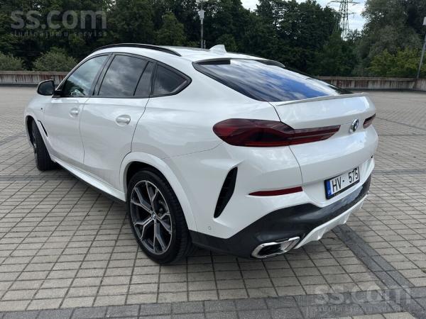 White BMW X6 2020 in Riga, with an engine capacity of 3.00 L and mileage of 99 thousand km for 56900 €, photo 3 on AUTOMOTO.COM.LV