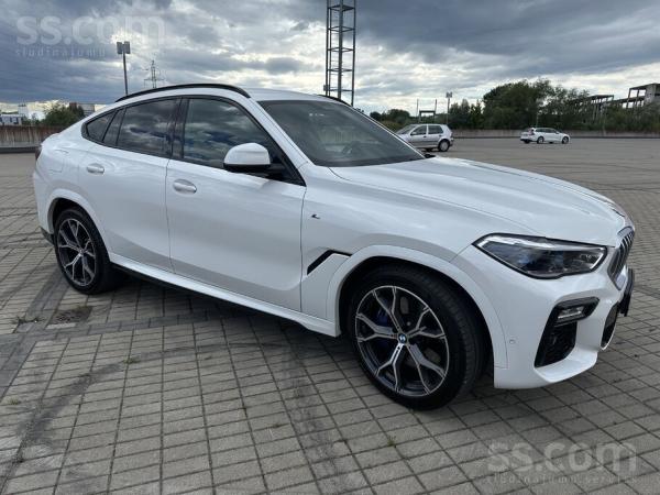 White BMW X6 2020 in Riga, with an engine capacity of 3.00 L and mileage of 99 thousand km for 56900 €, photo 5 on AUTOMOTO.COM.LV