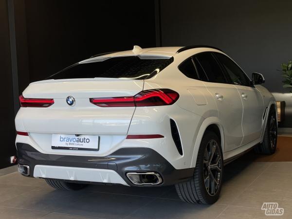 White BMW X6 2020 in Klaipeda, with an engine capacity of 3.00 L and mileage of 143 thousand km for 52974 €, photo 4 on AUTOMOTO.COM.LV