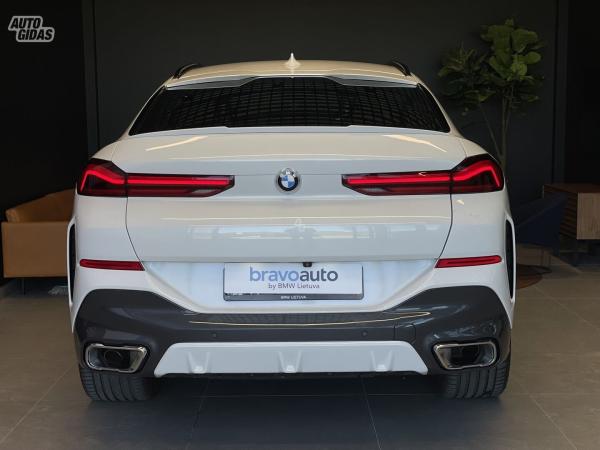 White BMW X6 2020 in Klaipeda, with an engine capacity of 3.00 L and mileage of 143 thousand km for 52974 €, photo 5 on AUTOMOTO.COM.LV