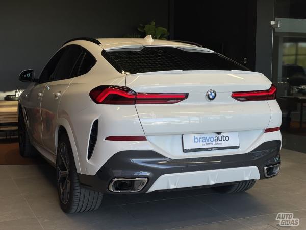 White BMW X6 2020 in Klaipeda, with an engine capacity of 3.00 L and mileage of 143 thousand km for 52974 €, photo 6 on AUTOMOTO.COM.LV