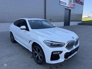 White BMW X6 2021 in Kaunas, with an engine capacity of 2.99 L and mileage of 64 thousand km for 54999 €, photo 4 on AUTOMOTO.COM.LV