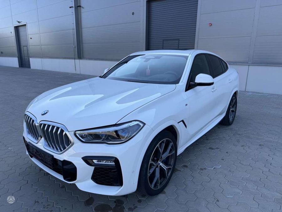 White BMW X6 2021 in Kaunas, with an engine capacity of 2.99 L and mileage of 64 thousand km for 54999 €, photo 5 on AUTOMOTO.COM.LV
