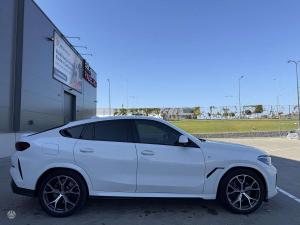White BMW X6 2021 in Kaunas, with an engine capacity of 2.99 L and mileage of 64 thousand km for 54999 €, photo 7 on AUTOMOTO.COM.LV