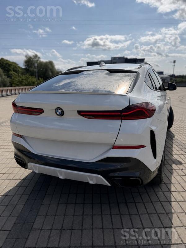 БМВ Х6 2022 в Рига на AUTOMOTO.COM.LV Белый БМВ Х6 2022 в Рига, объемом двигателя 3.00 л и пробегом 90 тыс. км за 55000 €, фото 4 на AUTOMOTO.COM.LV