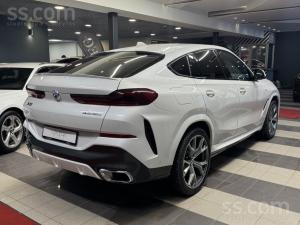 Balts BMW X6 2023 Rīga, ar dzinēja tilpumu 3.00 L un nobraukumu 52 tūkst. km par 69990 €, foto 4 vietnē AUTOMOTO.COM.LV