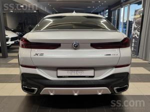 Balts BMW X6 2023 Rīga, ar dzinēja tilpumu 3.00 L un nobraukumu 52 tūkst. km par 69990 €, foto 5 vietnē AUTOMOTO.COM.LV