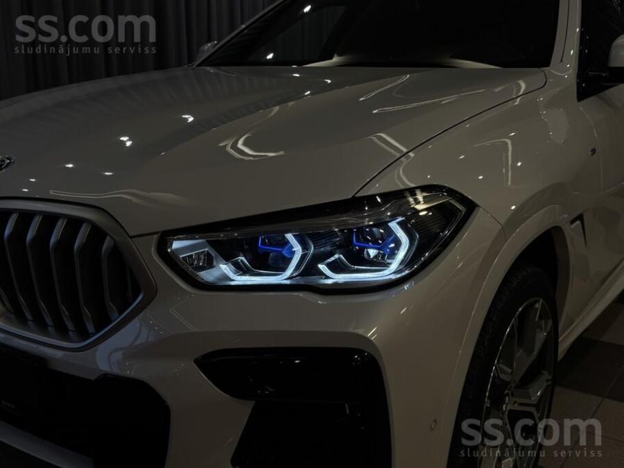 Balts BMW X6 2023 Rīga, ar dzinēja tilpumu 3.00 L un nobraukumu 52 tūkst. km par 69990 €, foto 32 vietnē AUTOMOTO.COM.LV