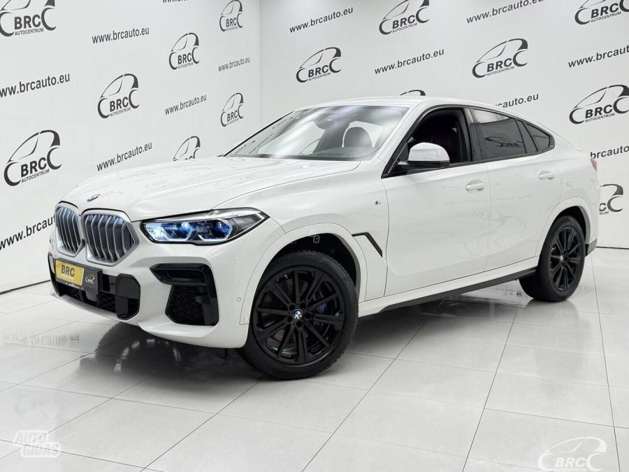 White BMW X6 2023 in Avizieniai, with an engine capacity of 3.00 L and mileage of 69 thousand km for 59900 €, photo 1 on AUTOMOTO.COM.LV