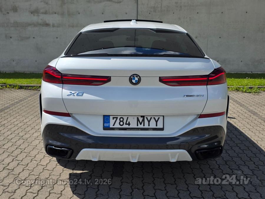 White BMW X6 2023 in Viljandi, with an engine capacity of 3.00 L and mileage of 33 thousand km for 69999 €, photo 5 on AUTOMOTO.COM.LV