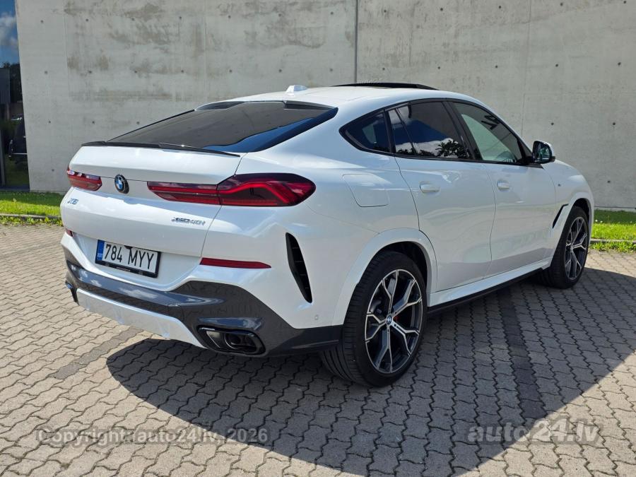White BMW X6 2023 in Viljandi, with an engine capacity of 3.00 L and mileage of 33 thousand km for 69999 €, photo 6 on AUTOMOTO.COM.LV