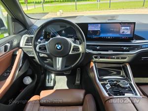 White BMW X6 2023 in Viljandi, with an engine capacity of 3.00 L and mileage of 33 thousand km for 69999 €, photo 14 on AUTOMOTO.COM.LV