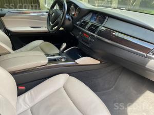 White BMW X6 2012 in Riga, with an engine capacity of 3.00 L and mileage of 154 thousand km for 15500 €, photo 4 on AUTOMOTO.COM.LV
