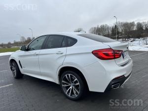 White BMW X6 2015 in Rezekne, with an engine capacity of 3.00 L and mileage of 225 thousand km for 22000 €, photo 4 on AUTOMOTO.COM.LV