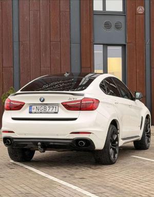White BMW X6 2016 in Kaunas, with an engine capacity of 3.00 L and mileage of 153 thousand km for 24500 €, photo 6 on AUTOMOTO.COM.LV