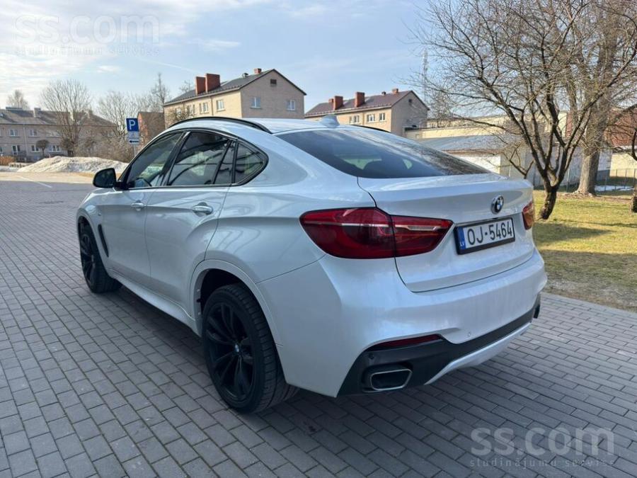 White BMW X6 2016 in Balvi, with an engine capacity of 3.00 L and mileage of 210 thousand km for 25900 €, photo 4 on AUTOMOTO.COM.LV