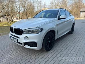 White BMW X6 2016 in Balvi, with an engine capacity of 3.00 L and mileage of 210 thousand km for 25900 €, photo 5 on AUTOMOTO.COM.LV