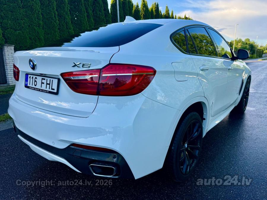 White BMW X6 2018 in Tallinn, with an engine capacity of 3.00 L and mileage of 120 thousand km for 32999 €, photo 9 on AUTOMOTO.COM.LV